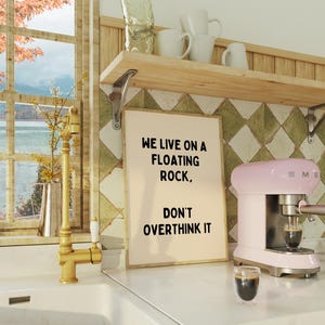 We Live on a Floating Rock Poster | Don't Overthink It Quote | Matte ...