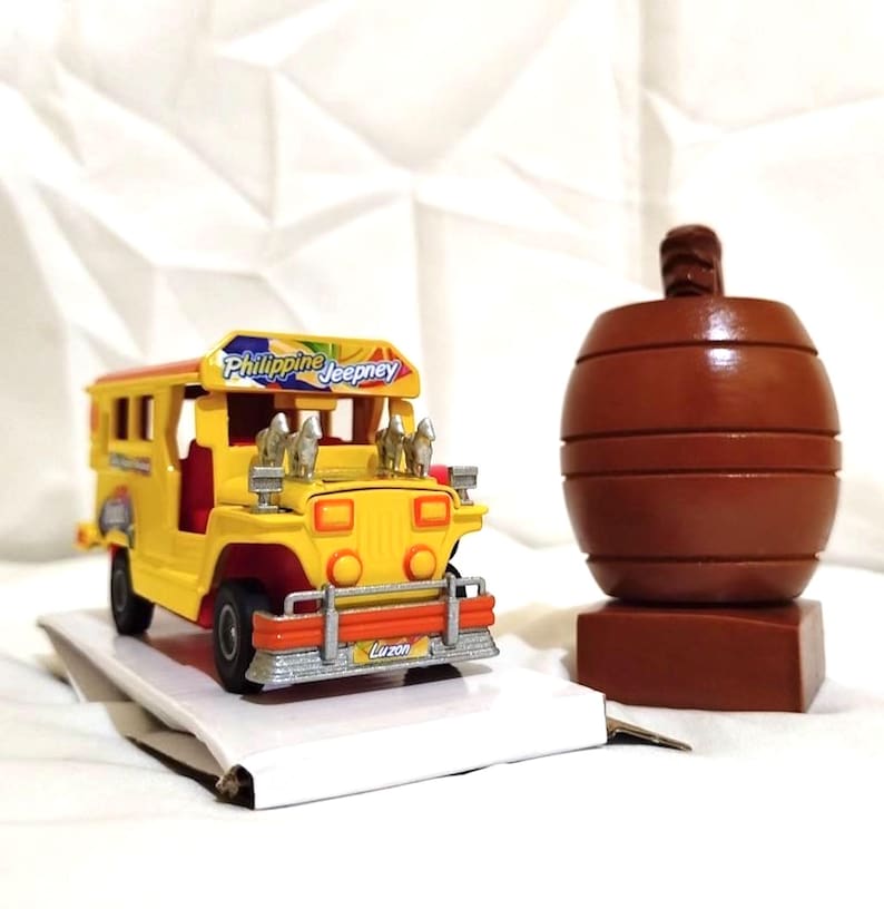 Yellow Medium Size Jeepney Die-cast Metal Toy and Small Barrel Man ...
