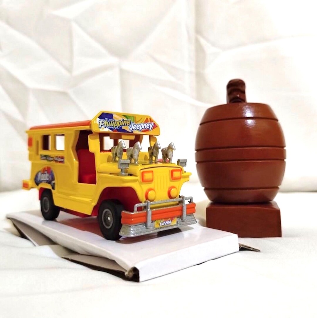 Yellow Medium Size Jeepney Die-cast Metal Toy and Small Barrel Man ...