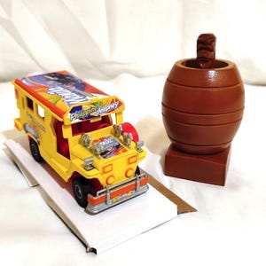 Yellow Medium Size Jeepney Die-cast Metal Toy and Small Barrel Man ...