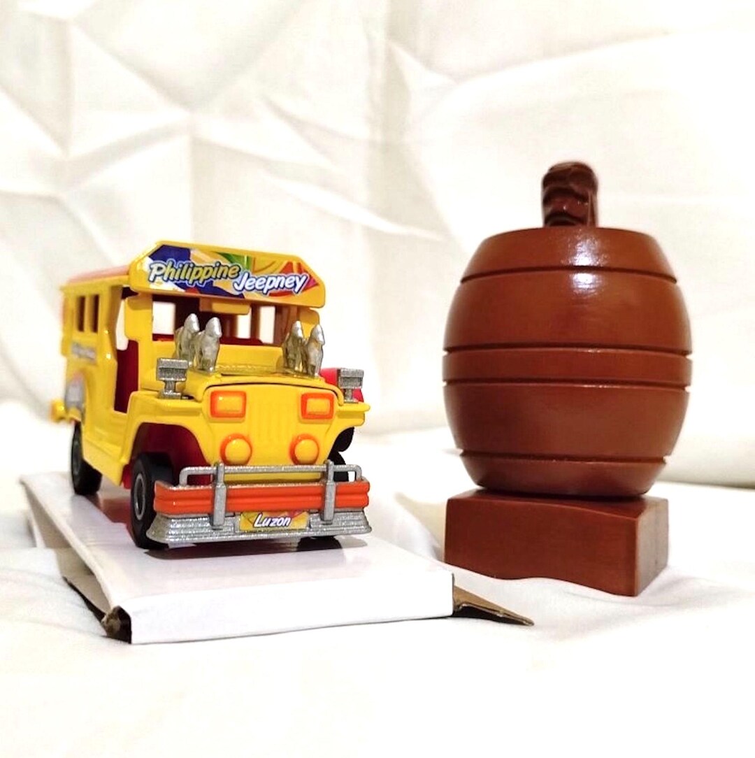 Yellow Medium Size Jeepney Die-cast Metal Toy and Small Barrel Man ...