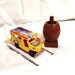 Yellow Medium Size Jeepney Die-cast Metal Toy and Small Barrel Man ...