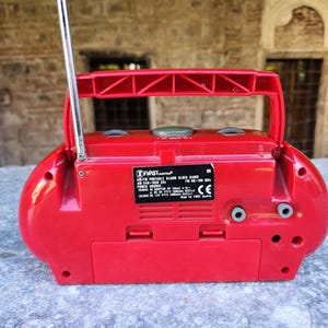 Red First Austria Portable Am/fm Alarm Clock Radio, Eye-catching ...