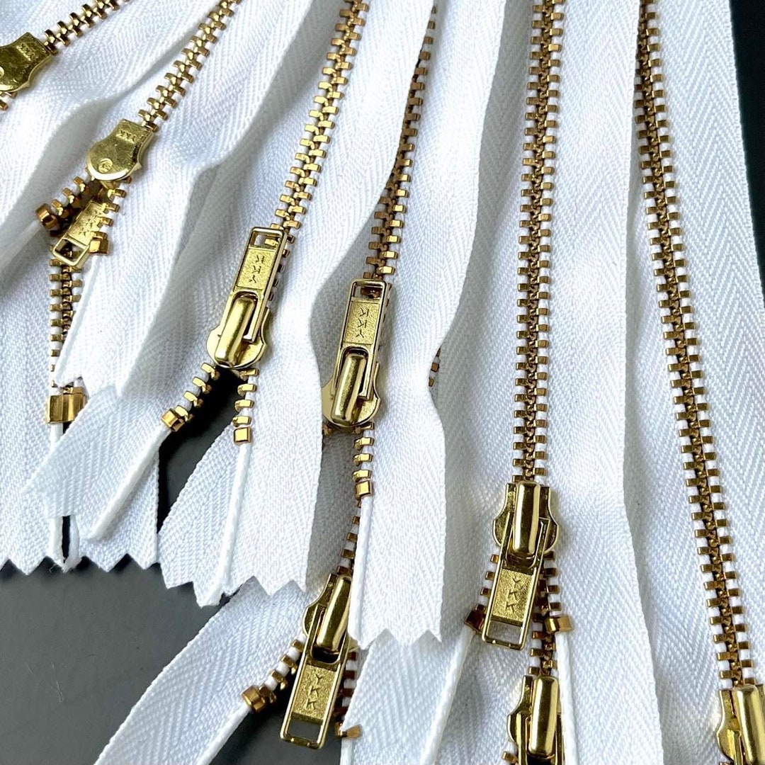 White YKK Zippers. [3, 5] Pieces. 12-inch. Brass Pulls. Color 501. Metal Zipper, Closed Bottom ...