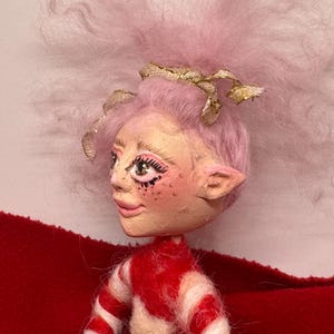 Santa’s Little Elf, in Red and White and a White Star on Her Chest ...