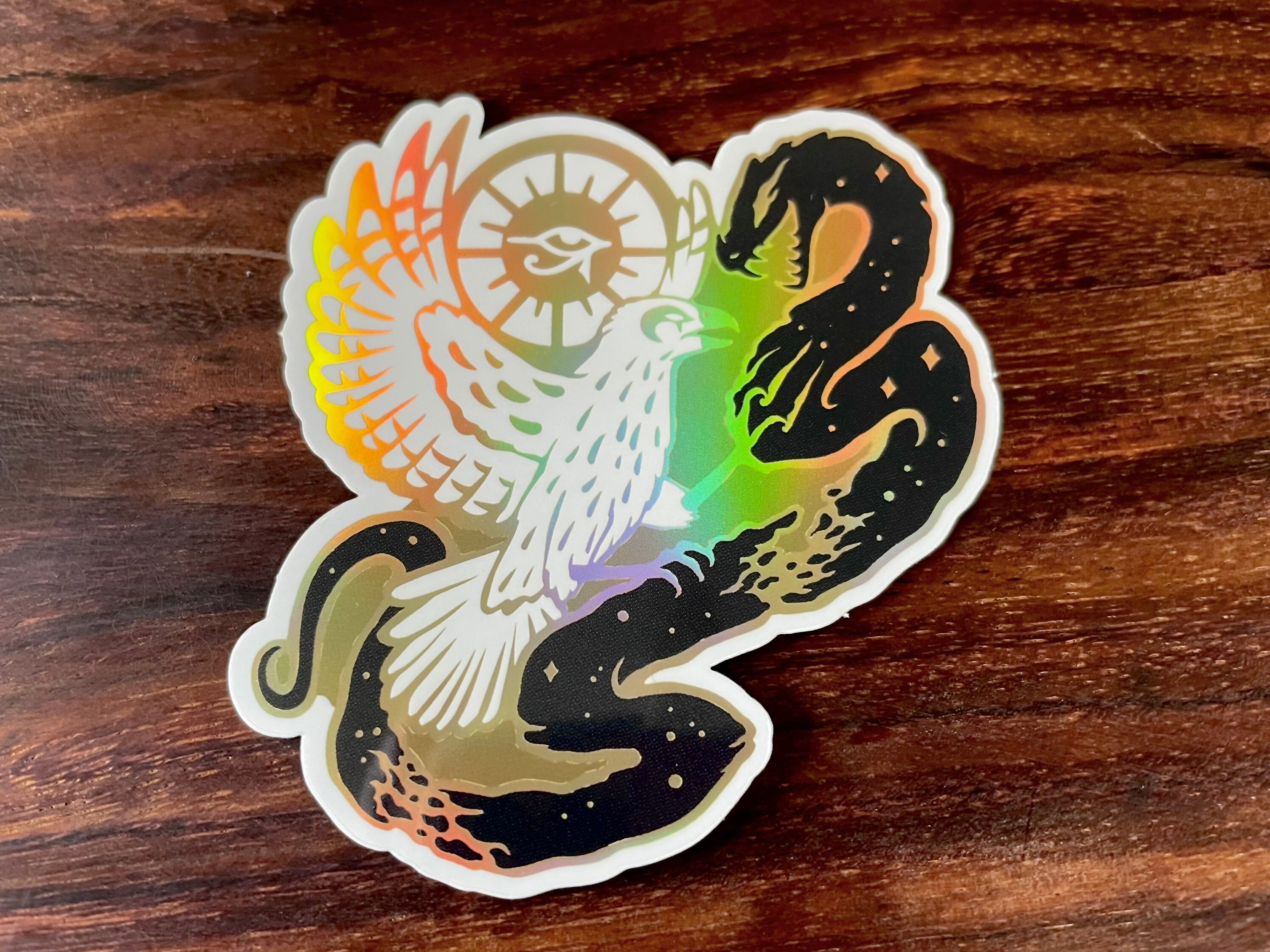 Ra vs Apep Holographic Sticker — Amanda Tulacz Illustration