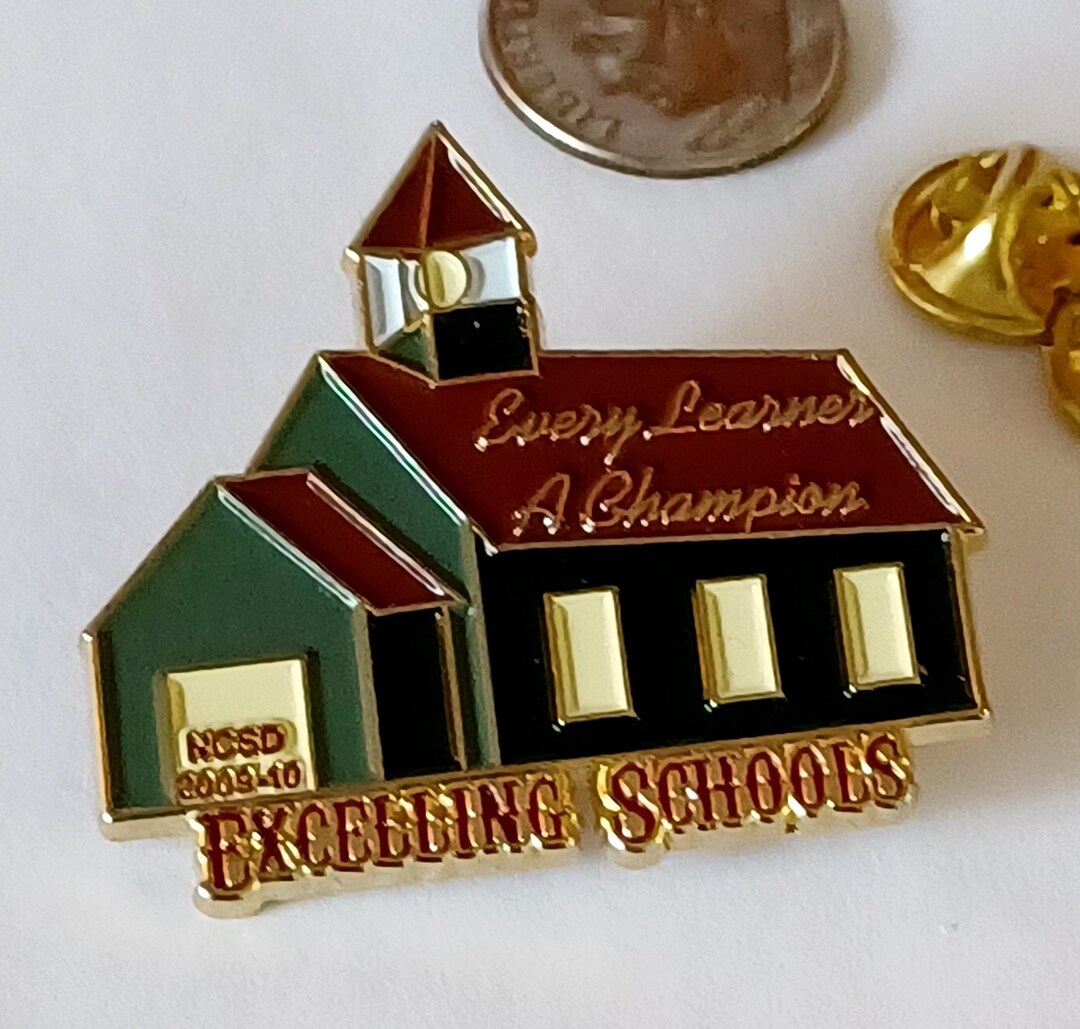 NCSD Excelling Schools Every Learner a Champion School House Lapel Hat ...