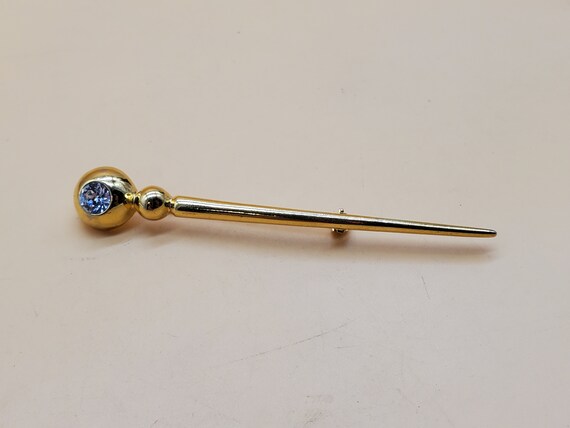 vintage gold tone long staff scepter brooch with clea… - Gem