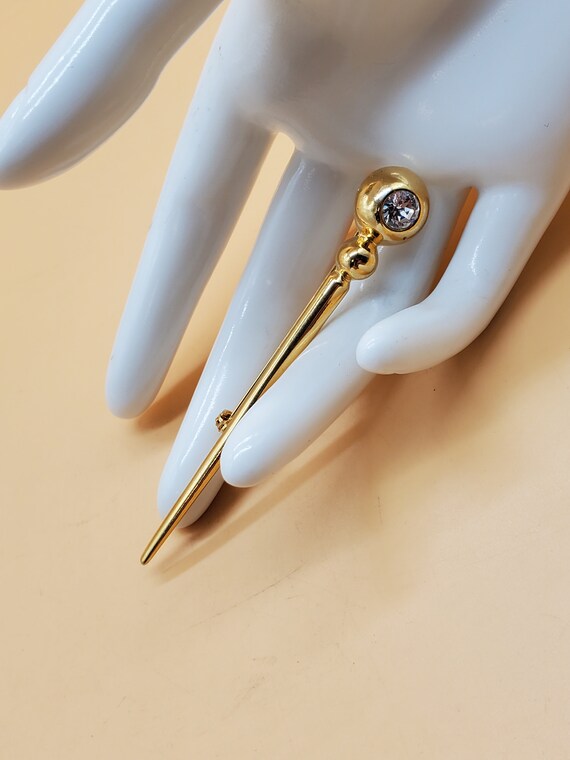 vintage gold tone long staff scepter brooch with clea… - Gem