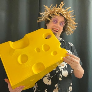 The "big Cheese!" A Giant Piece of Cheese. It's Literally a Huge Wedge ...