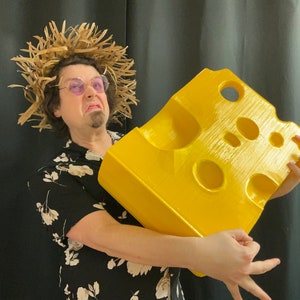 The "big Cheese!" A Giant Piece of Cheese. It's Literally a Huge Wedge ...