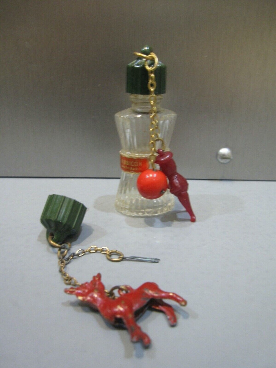 Vintage Rudolph Perfume Bottle: Rubicon 5th Ave Holiday Label, 2 Tops ...