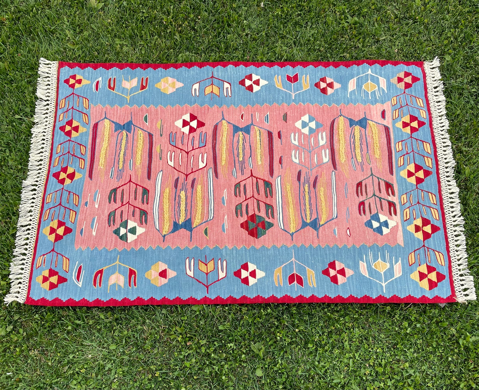 Hand-woven Carpet With Colorful Pink Flower Garden Pink Background ...