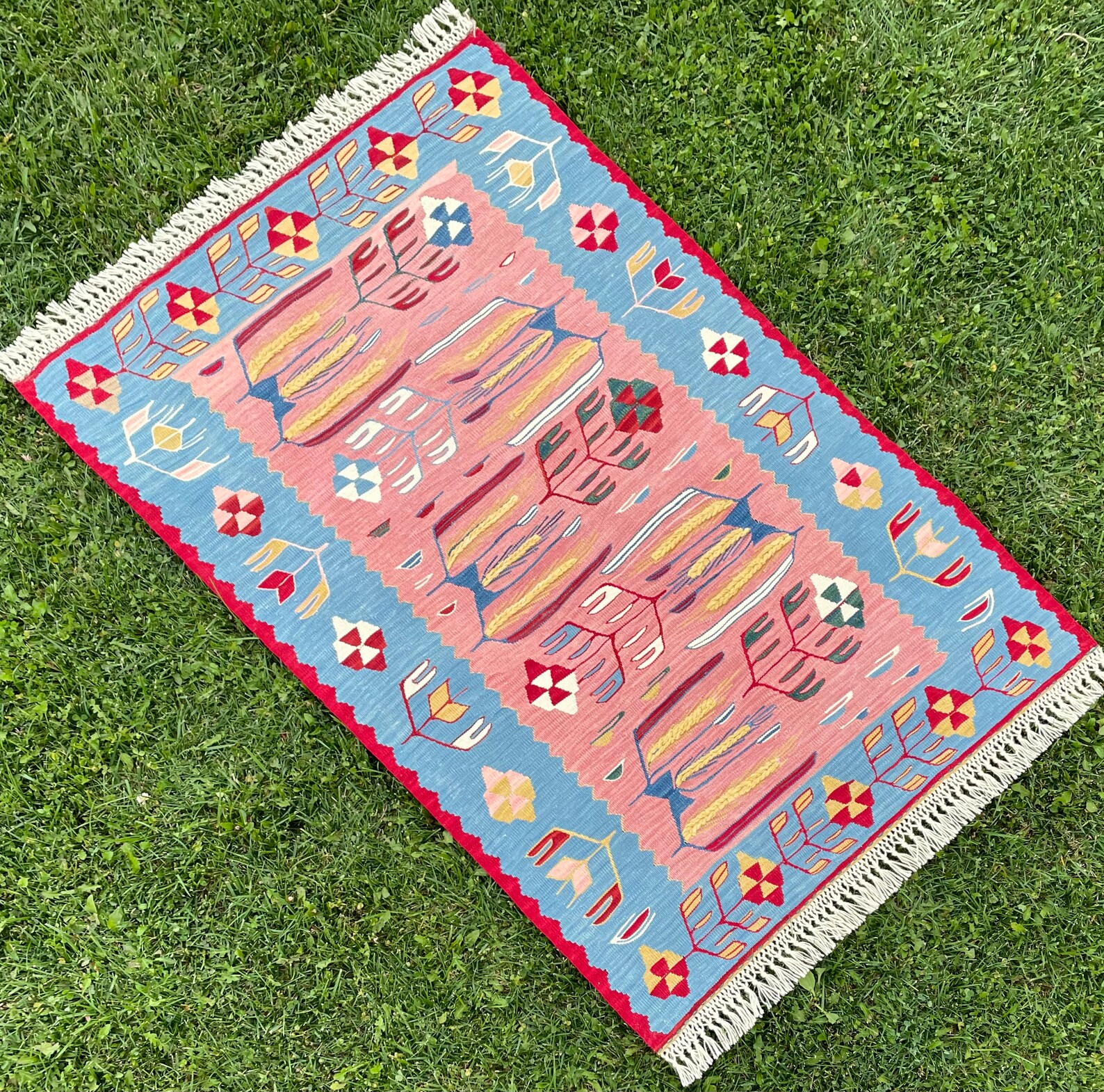 Hand-woven Carpet With Colorful Pink Flower Garden Pink Background ...