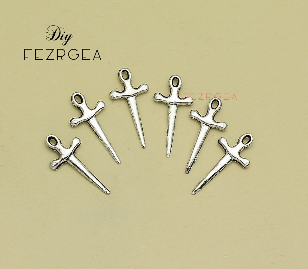 40pcs--20x10mm, Antique Silver Mini Sword Charms. Swords Pendants. - Etsy