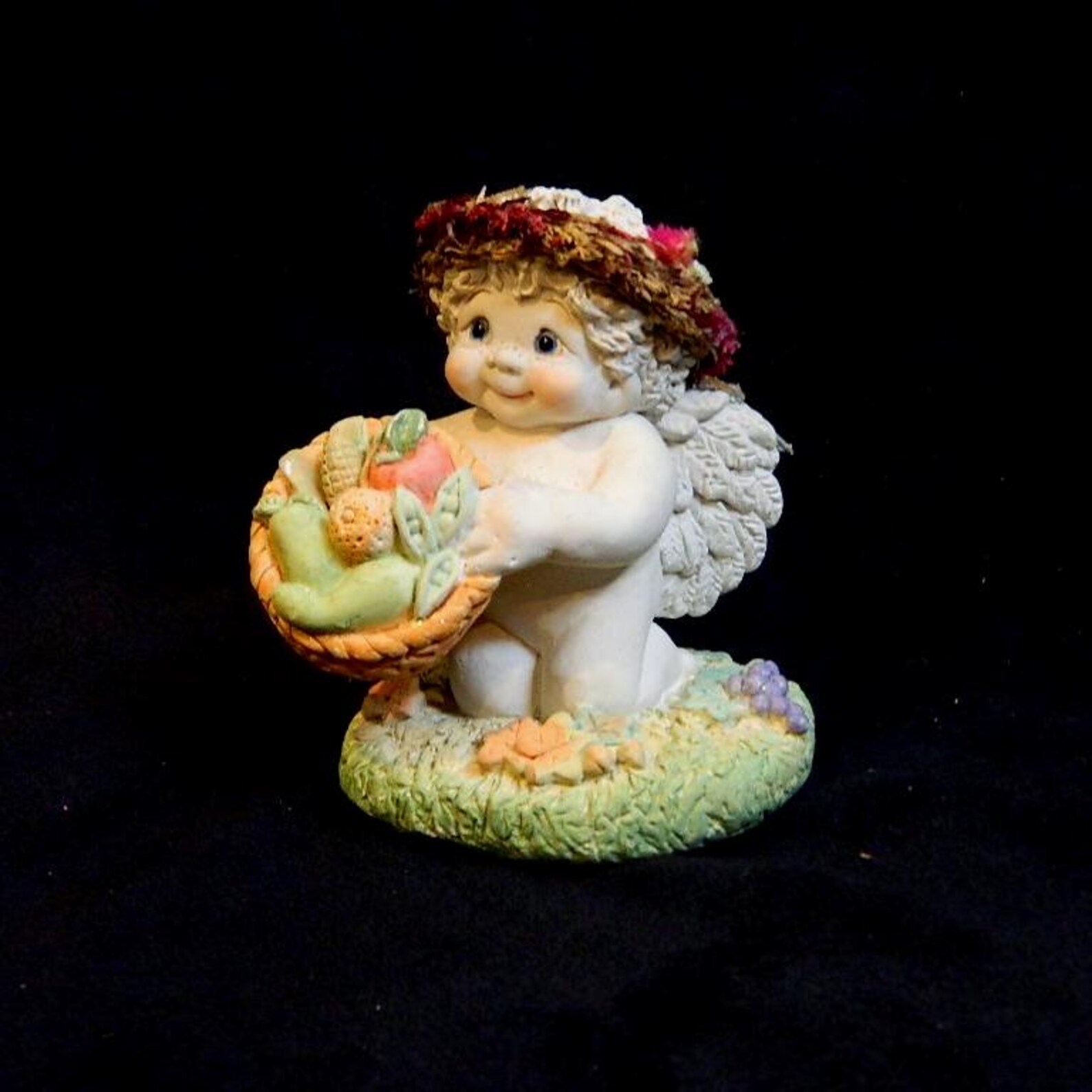 A Dreamsicles Figurine Holding a Cornucopia, Dated 2000, and Associated ...