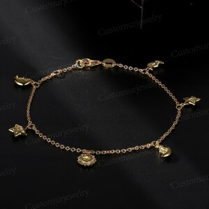 Gold Celestial Charm Bracelet With Sun, Moon, and Star Pendants ...