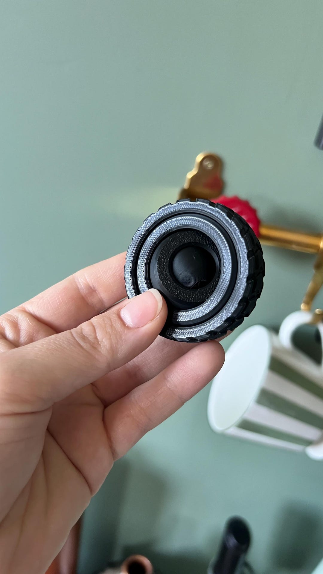 Tire Design Gyro Fidget Toy With Black Textured Tread and Smooth Center ...