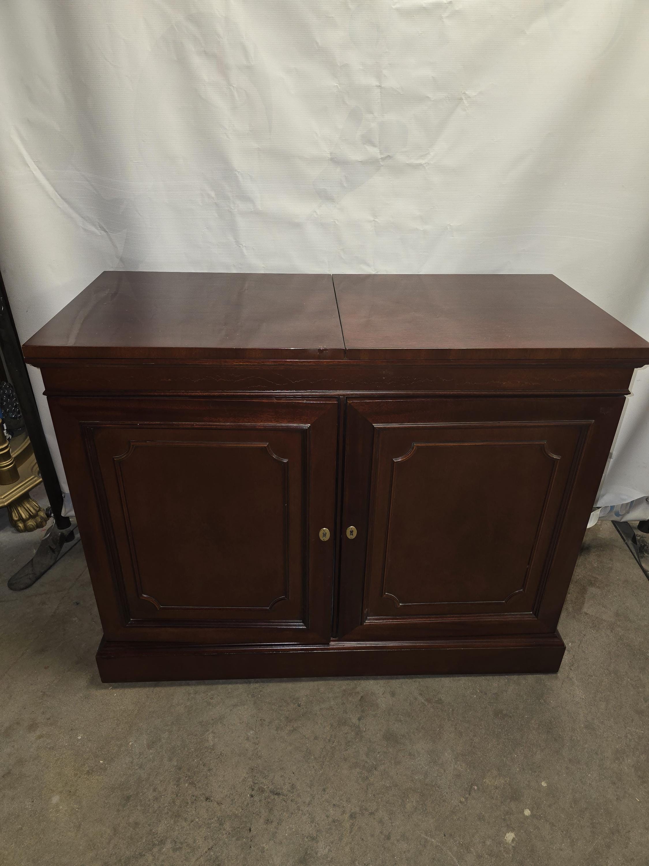 Flip top bar cabinet store
