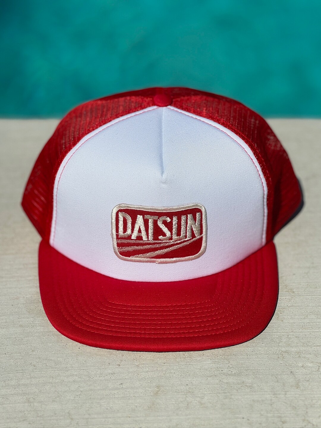 Vintage Datsun Logo Patch on a White and Red Mesh Trucker Hat - Etsy