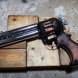 Metal Souvenir. Revolver. A Brutal Gift. Restaurant Decor. Home Decor ...