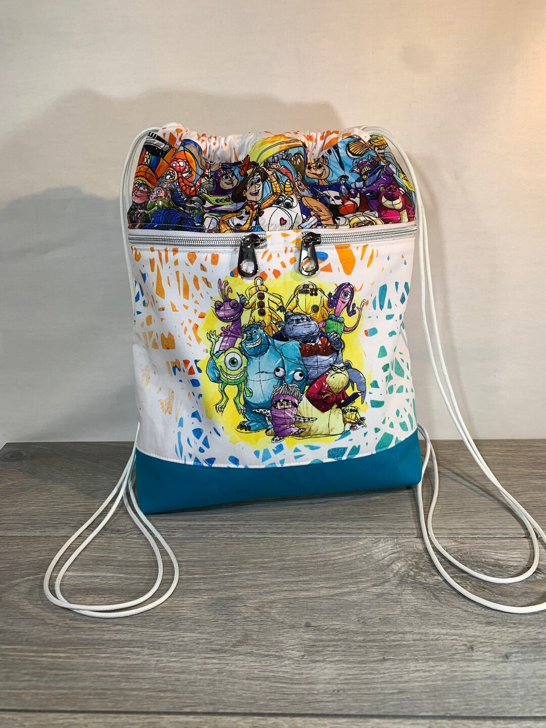 Disney Pixar Backstitch Fabric Begonia Backpack, Drawstring, Light Load ...