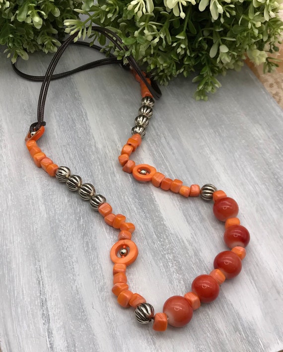 orange glass and shell - Gem