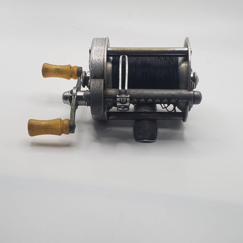 VINTAGE PFLUEGER NOBBY No. 1963 Chrome Fishing Reel Yellow Handles ...