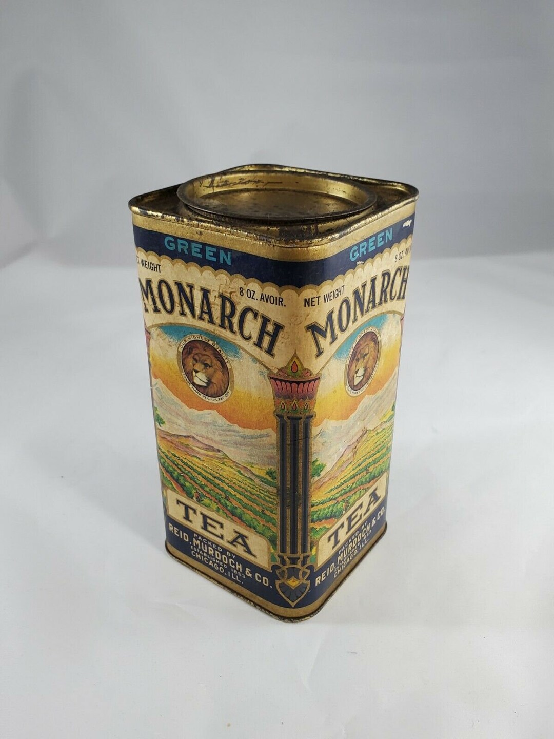 VINTAGE TIN LION Graphic Monarch Green Tea Tin Advertising Reid Murdock ...