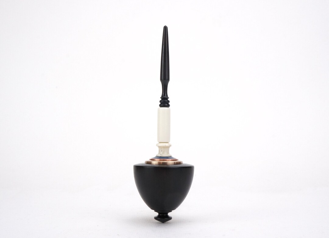 Wind-up Spinning Top - Etsy