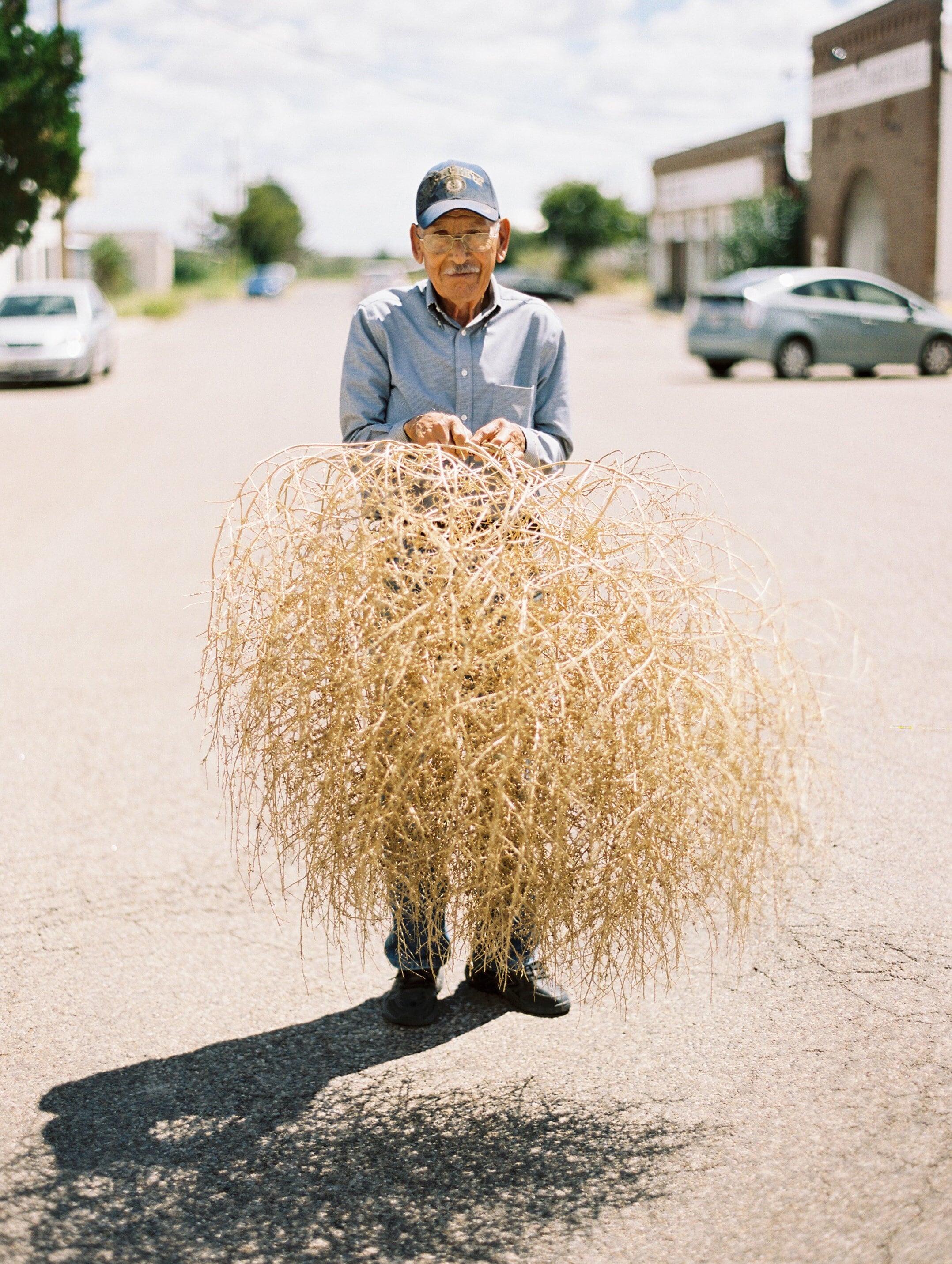 Vertical Photo of West Texas Man Holding Tumbleweed | West Texas Locals ...