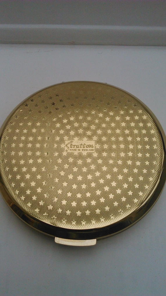 Stratton Convertible Compact Gold Coloured abstract … - Gem
