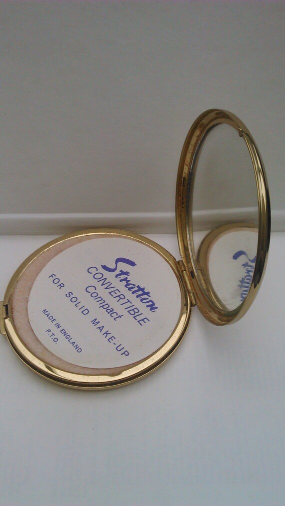 Stratton Convertible Compact Gold Coloured abstract … - Gem