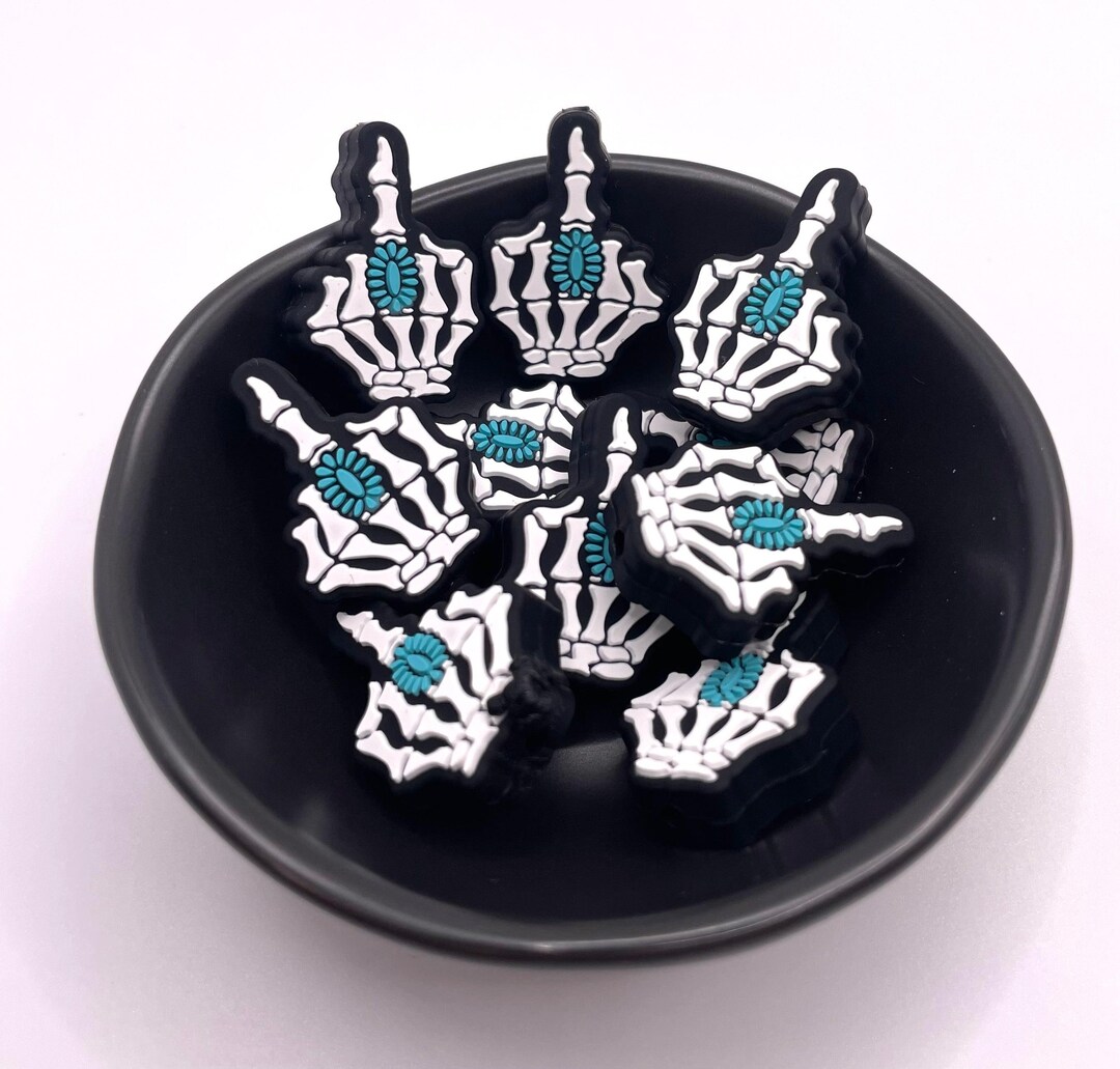 Skeleton Flip off Conch Focal - Etsy