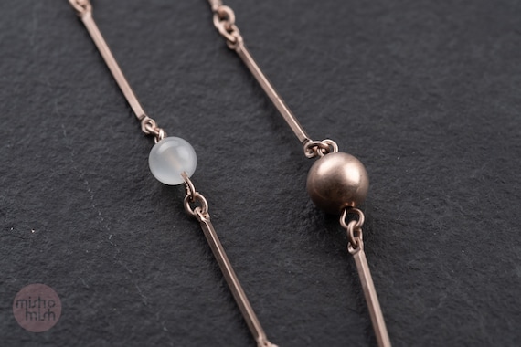 Unique, long chain of rods with balls and moonstone, … - Gem