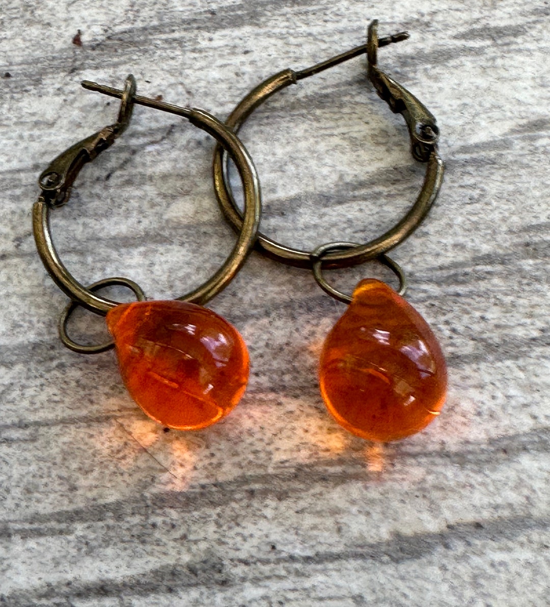 Pretty Transparent Hyacinth Orange Teardrop on Bronze Snap Closure ...