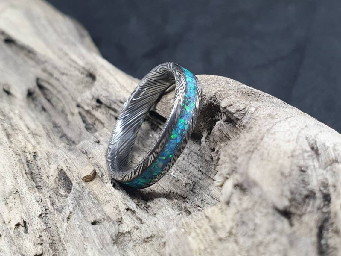 Damascus stainless steel glow ring with turquoise opal inlay. | Etsy