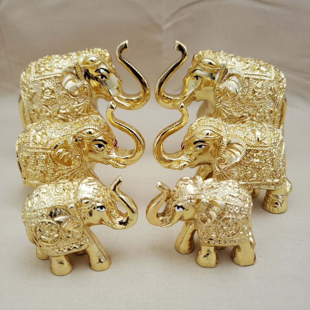 Gold Covering Traditional Elephants, Self Embossed Intricate Design ...