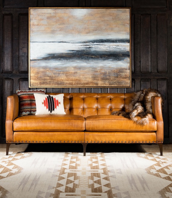 Tufted leather sofa store