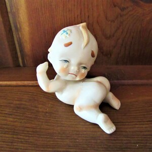 Vintage CRYING KEWPIE DOLL Bisque Porcelain Figurine With Bandage on ...