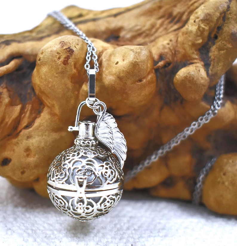 Silver Angel Caller Bola Necklace: Rose Harmony Chime Ball With Wing ...
