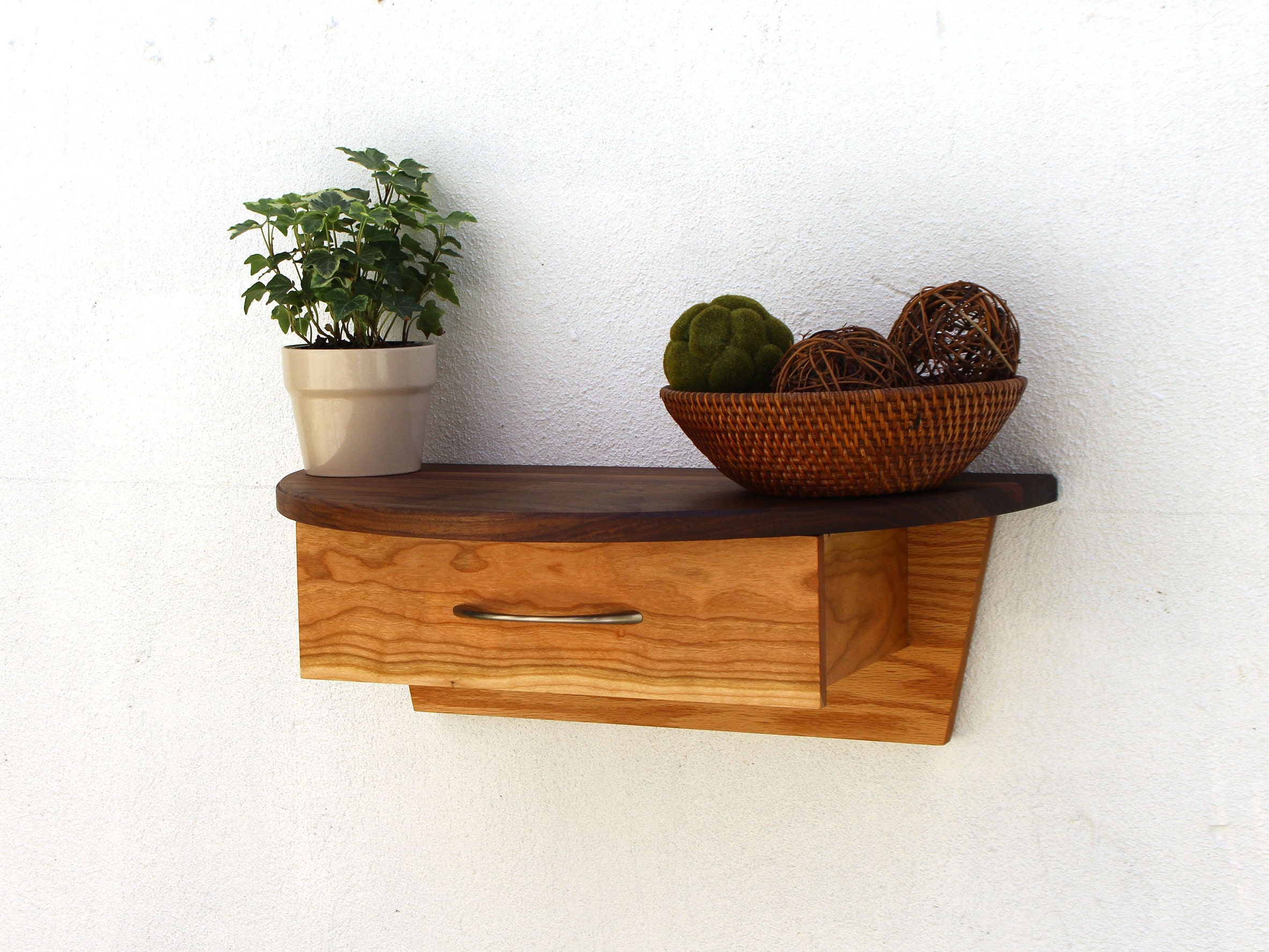 Small floating shelf with drawer store