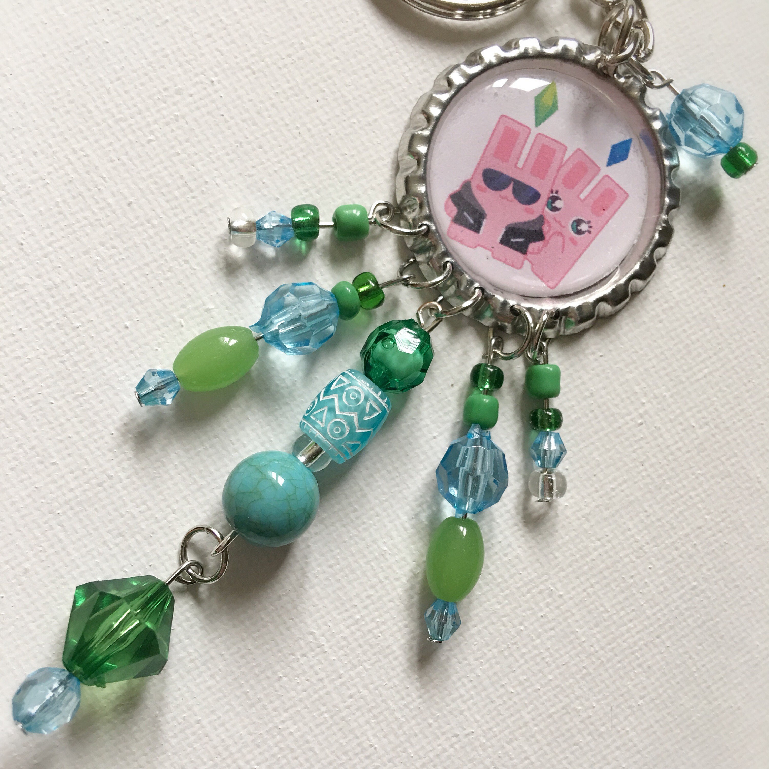 THE SIMS MOBILE Freezer Bunny With Plumbob Keychain bottlecap - Etsy