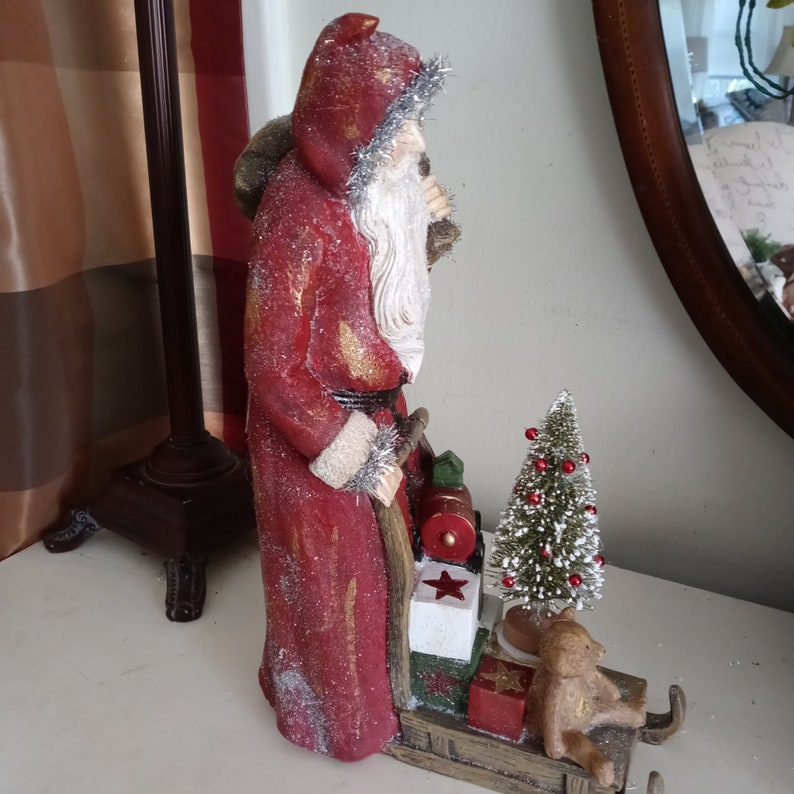 Tall Resin Santa Pushing A Sled - Etsy