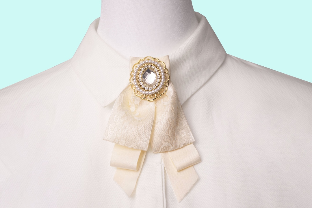 Broche ivoire avec joli charme en cristal, broche nœud, ruban cravate ...