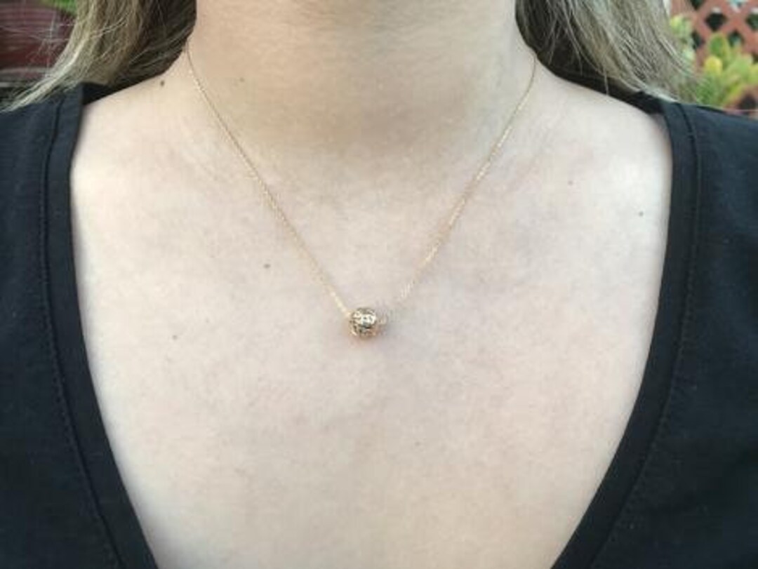 Floating Gold Scroll Ball - Etsy