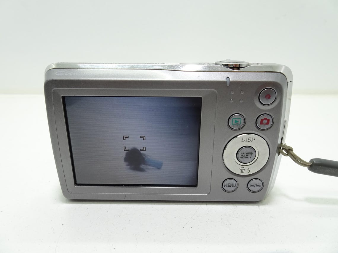 Casio Exilim EX-Z35 Black 12.1MP Digital Compact Camera - Silver With ...