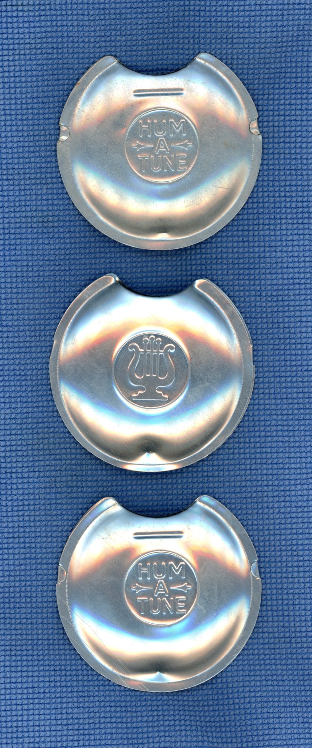 HUM A TUNE VINTAGE SMALL ROUND TIN KAZOO -- Antique Price Guide Details ...