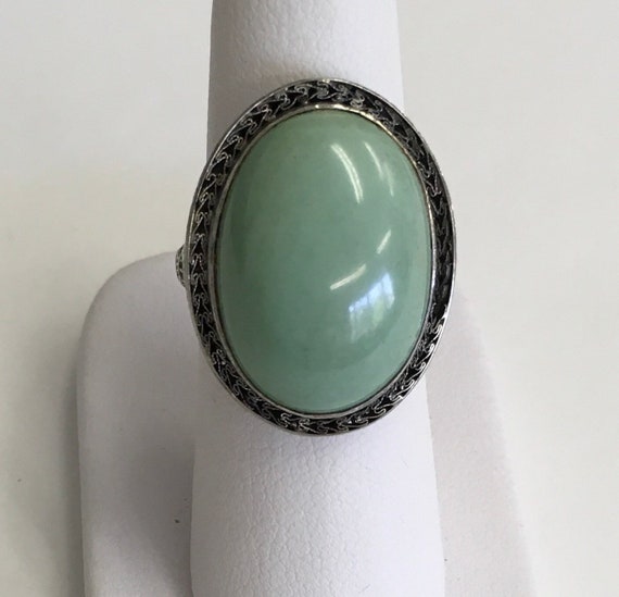 Antique filigree ring with green stone. - Gem