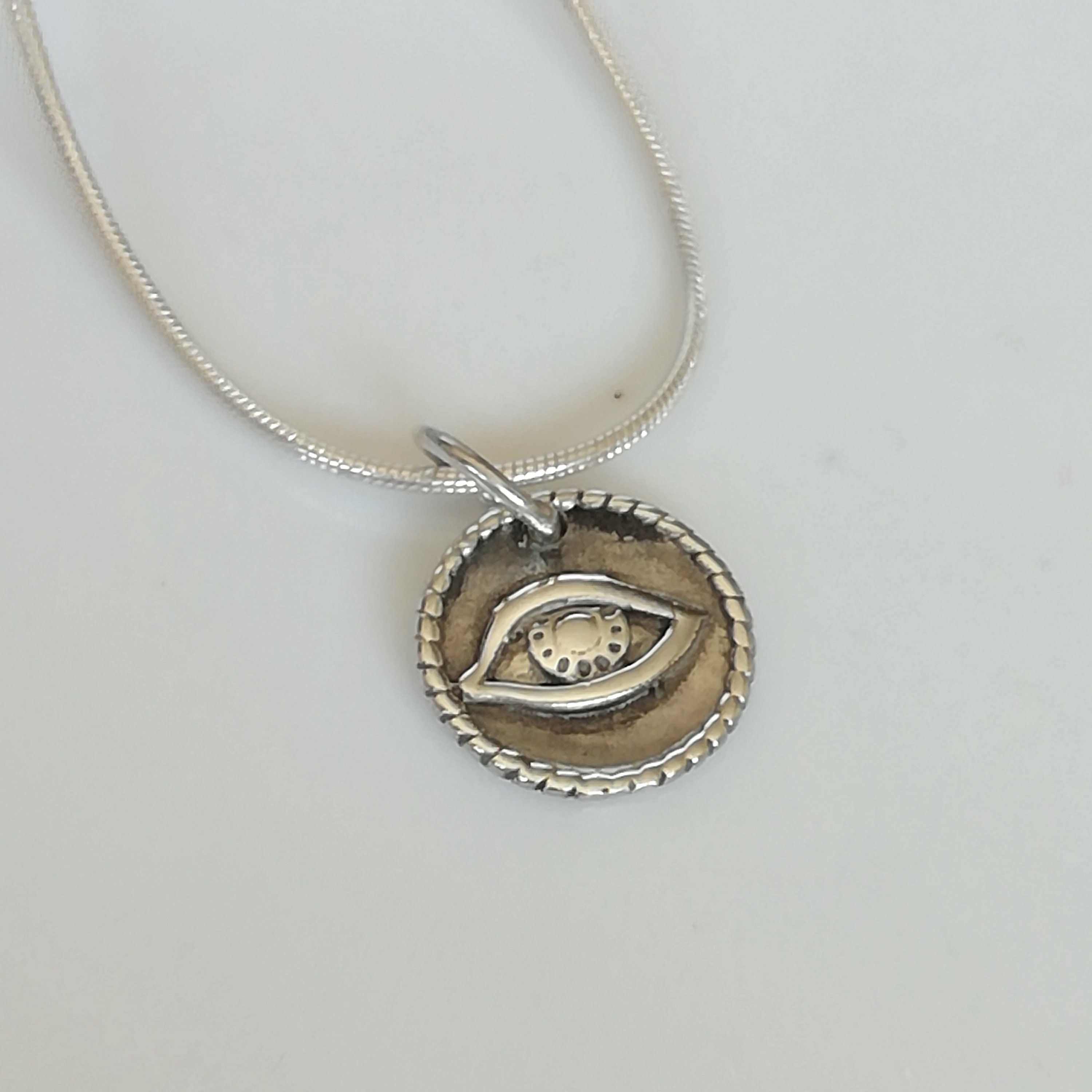 Eye of ra silver charm Talisman pendant Evil eye charm | Etsy
